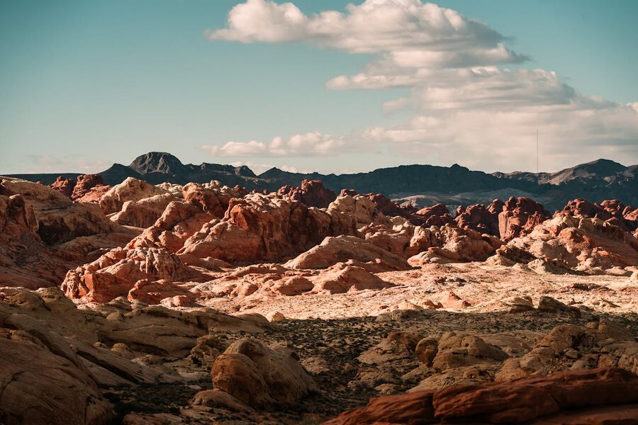 Scenic red rock formations under bright sky in Nevada desert