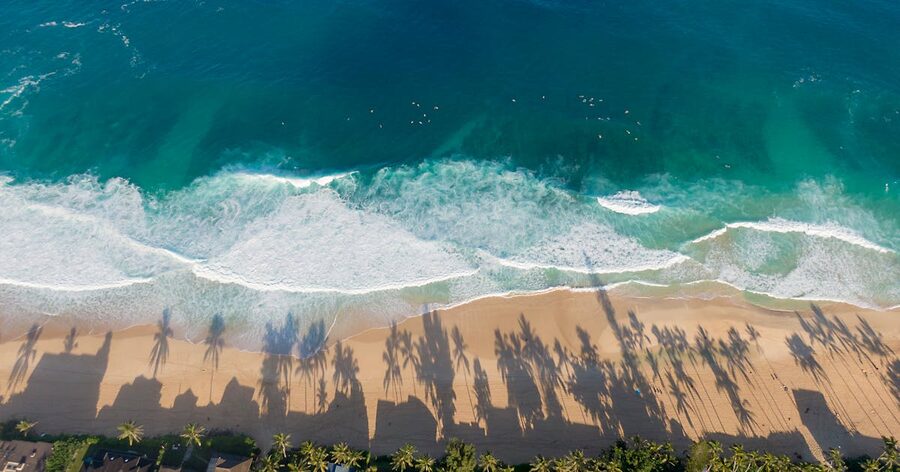 Aerial view of Waimanalo Beach with turquoise ocean and white sand