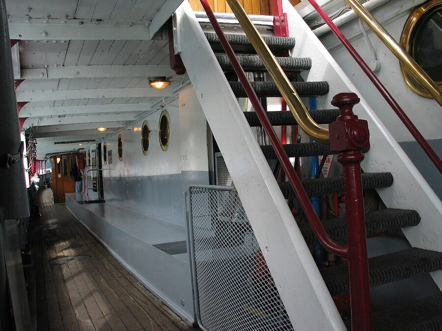 Interior wooden stairway aboard the TSS Earnslaw