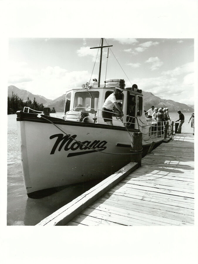 Tourists disembarking the Moana launch at Walter Peak Sheep Station, historical