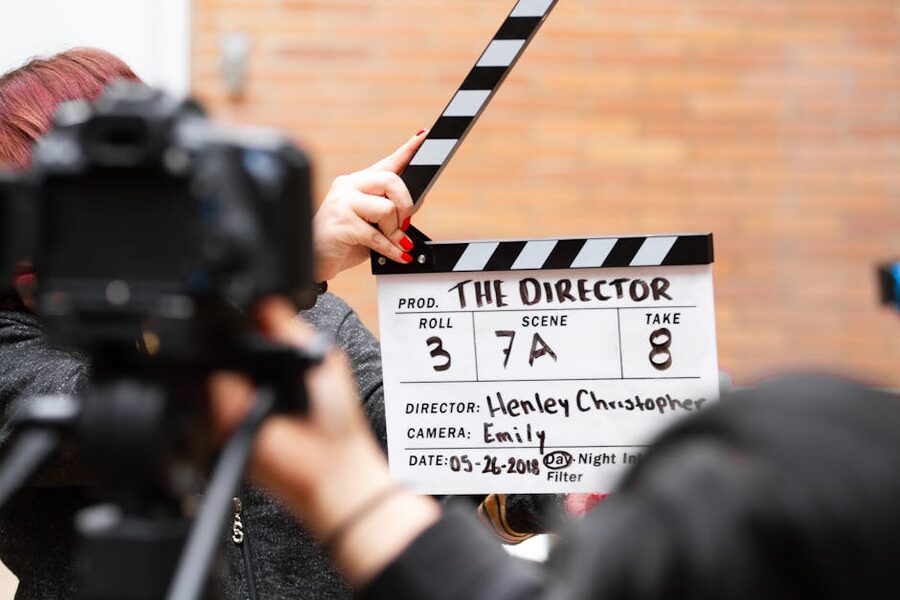 Film clapperboard on a working studio set