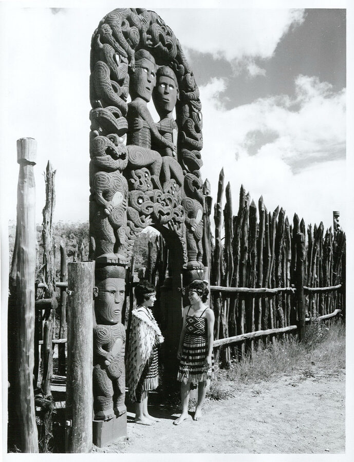 Historic photo of the carved gateway at Whakarewarewa village, Rotorua