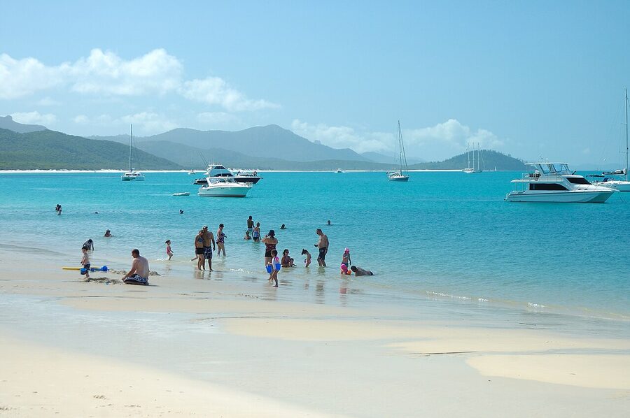 White silica sand of Whitehaven Beach with light blue water
