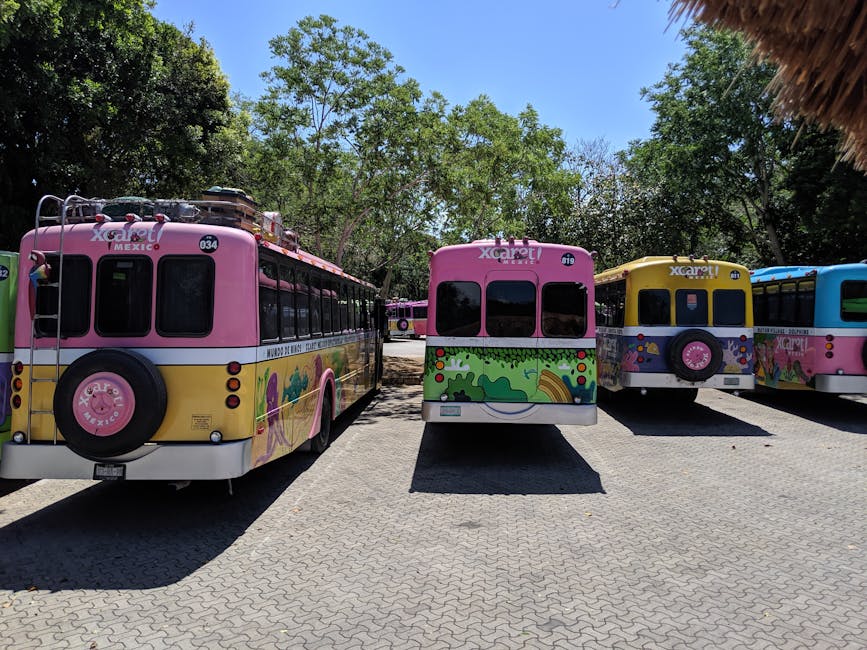 Xcaret colourful shuttle buses in Playa del Carmen