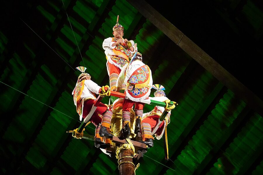 Voladores Papantla Flyers at Xcaret Park on top of ceremonial pole