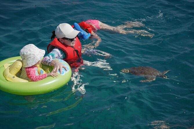 Yellow Boat Cruises: Afternoon Family Blue Lagoon & Turtle Cruise - The Experience & Crew
