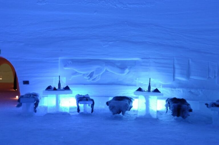 Ylläs: Snowmobile Tour to Arctic Snow Village & Snack - Visiting the Snow Village: Art in Ice