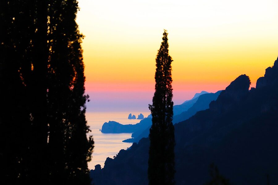 Amalfi Coast at sunset with mountains and sea