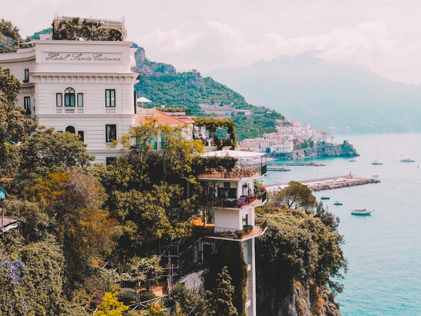 Amalfi Coast cliffs with boats and buildings