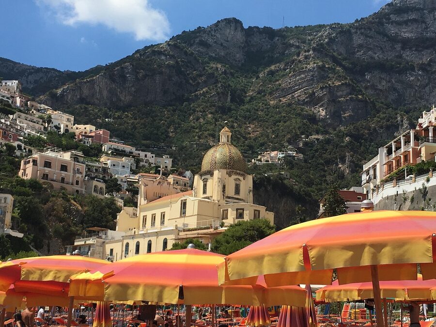 Positano pebble beach with sun loungers