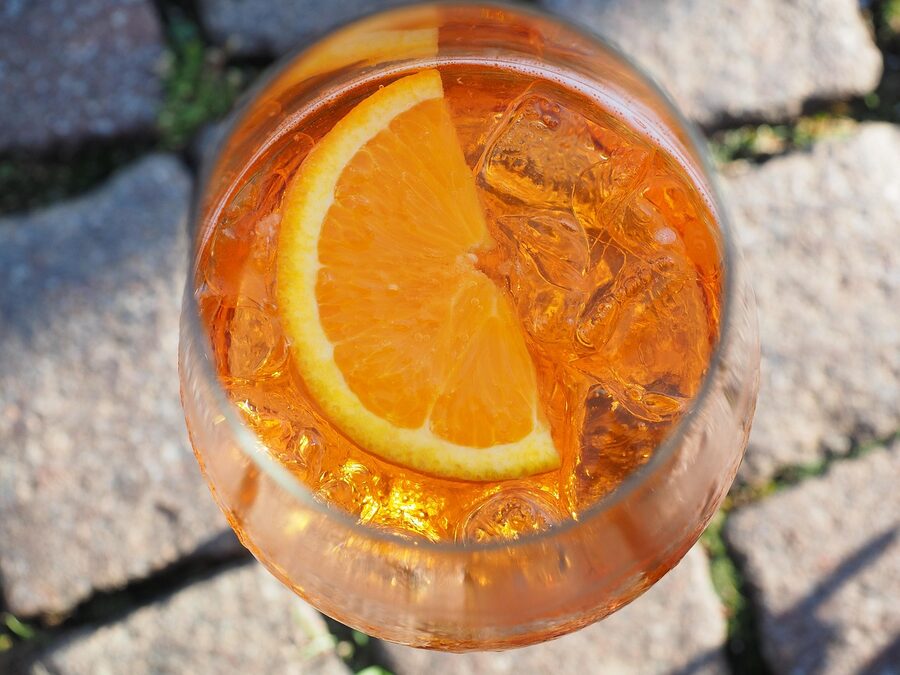 Aperol spritz glass Venice aperitivo at sunset