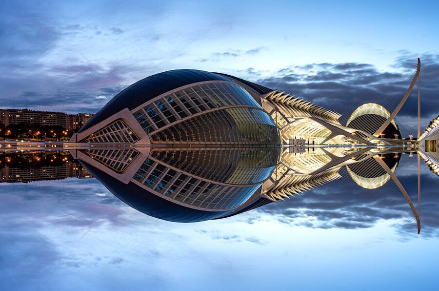 City of Arts and Sciences Valencia at twilight reflected in the pool