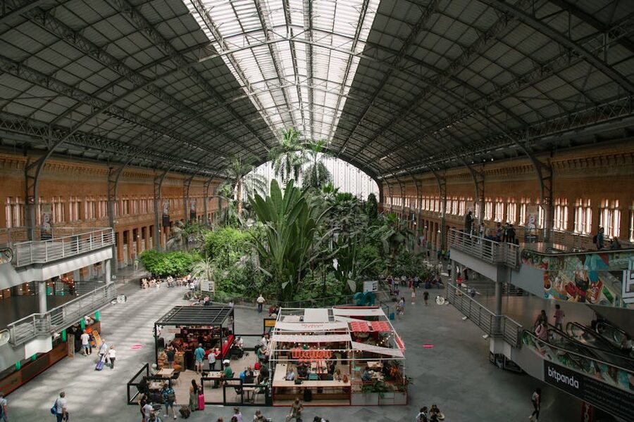 Inside Madrid Atocha train station with greenhouse