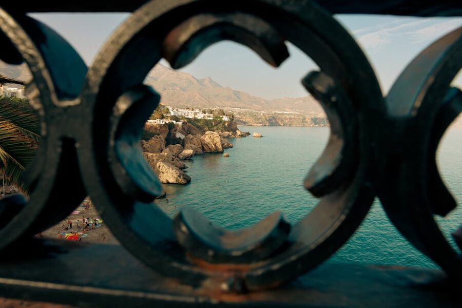 Wrought-iron railing at the Balcón de Europa with sea view