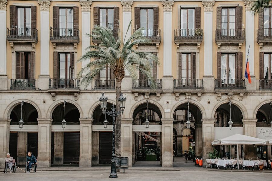 Placa Reial neoclassical square with palm trees Barcelona
