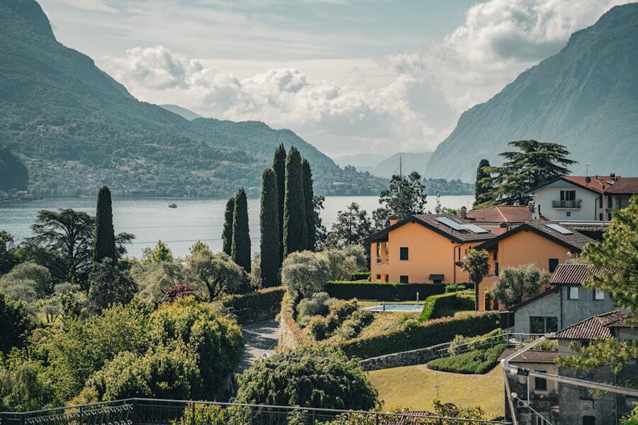 Picturesque view of Bellagio and Lake Como with lush greenery and mountains