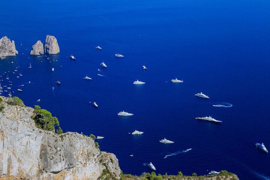 Aerial view of yachts and clear water off Capri coast
