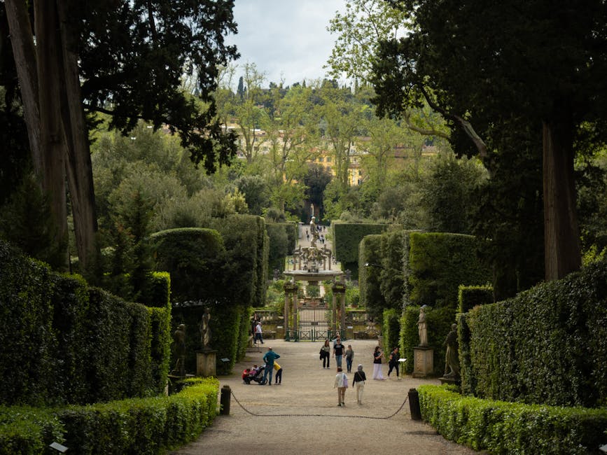 Visitors walking through Boboli Gardens Florence