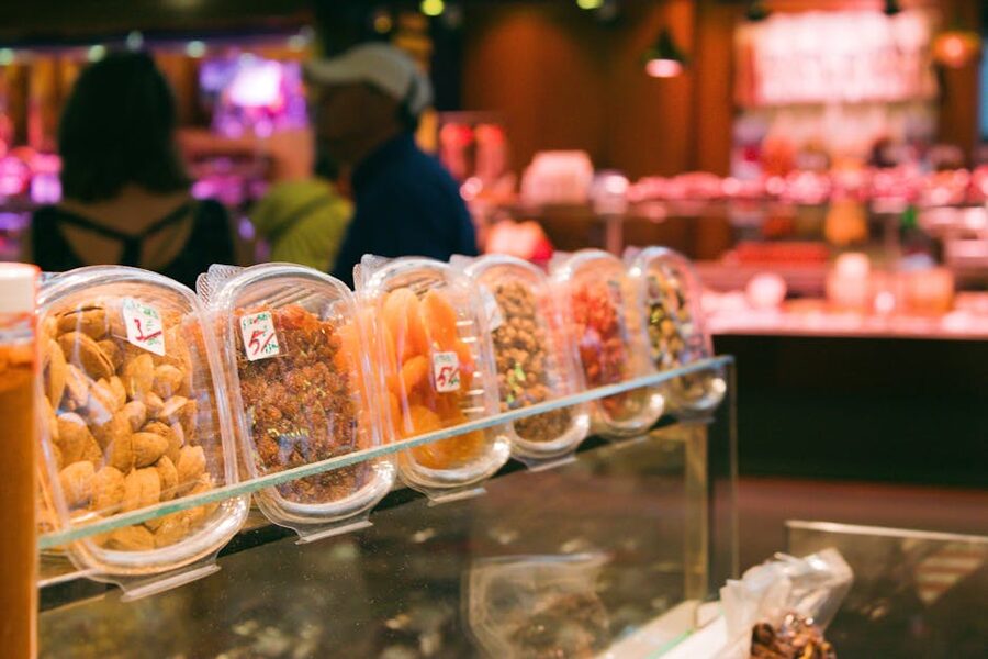 Dried fruits and nuts boxes at La Boqueria market Barcelona