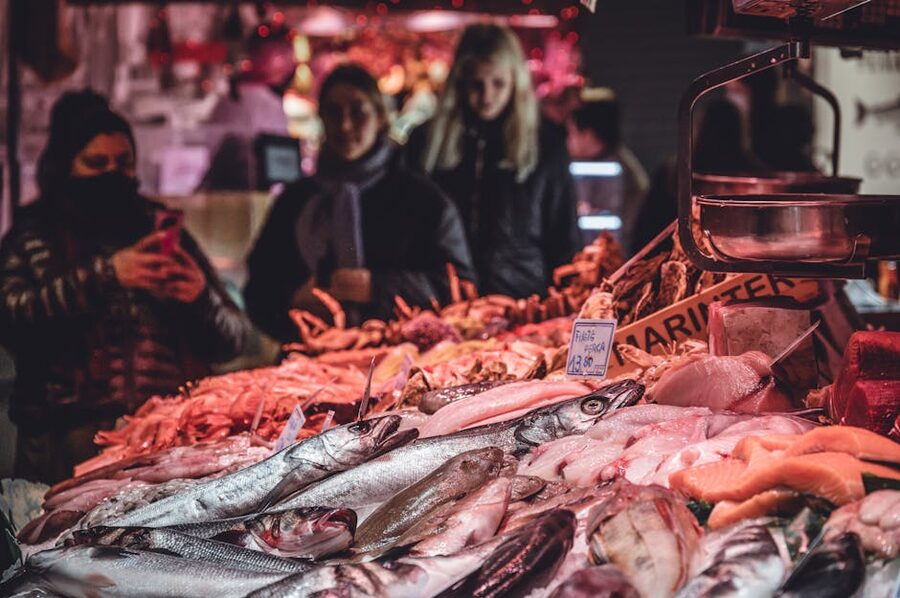 Fresh whole fish on ice at La Boqueria seafood counter