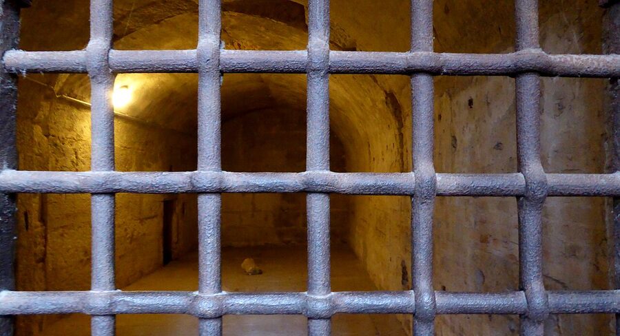 Doge's Palace prison dungeon iron bars and stone cells Venice
