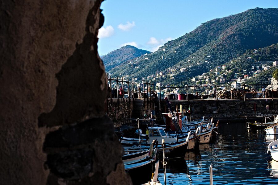 Camogli pier and harbor with fishing boats