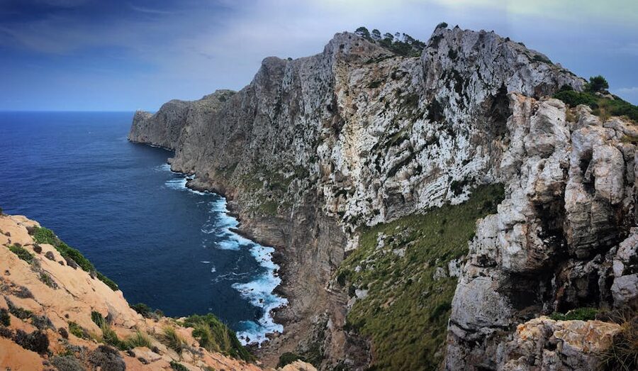 Towering cliffs above deep blue sea at Cap de Formentor, Mallorca