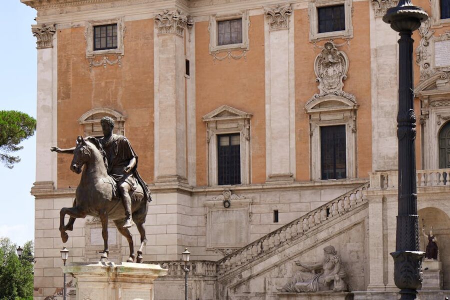 Equestrian statue of Marcus Aurelius in front of Renaissance building on Capitoline Hill in Rome
