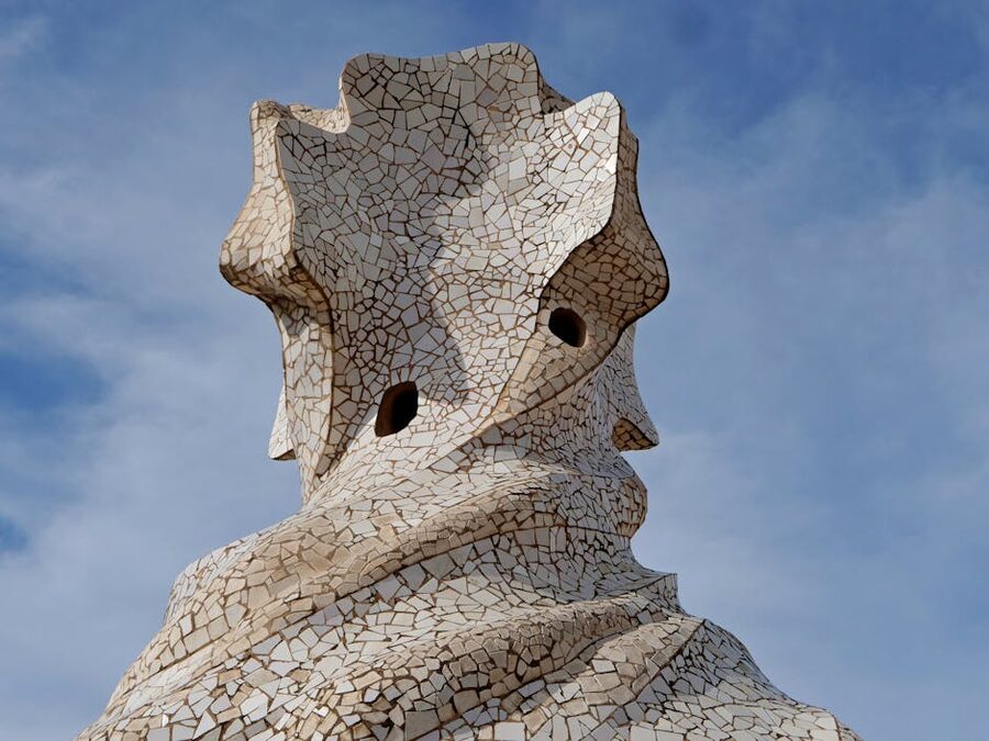 Mosaic-clad chimney close up on Casa Milà rooftop Barcelona