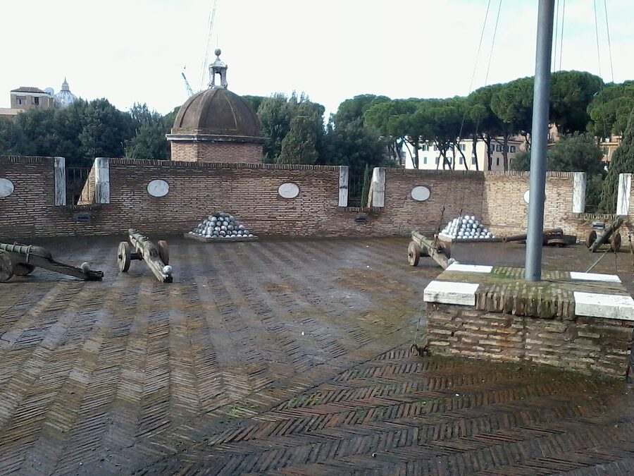 Cannons and stacked cannonballs inside Castel Sant'Angelo Rome