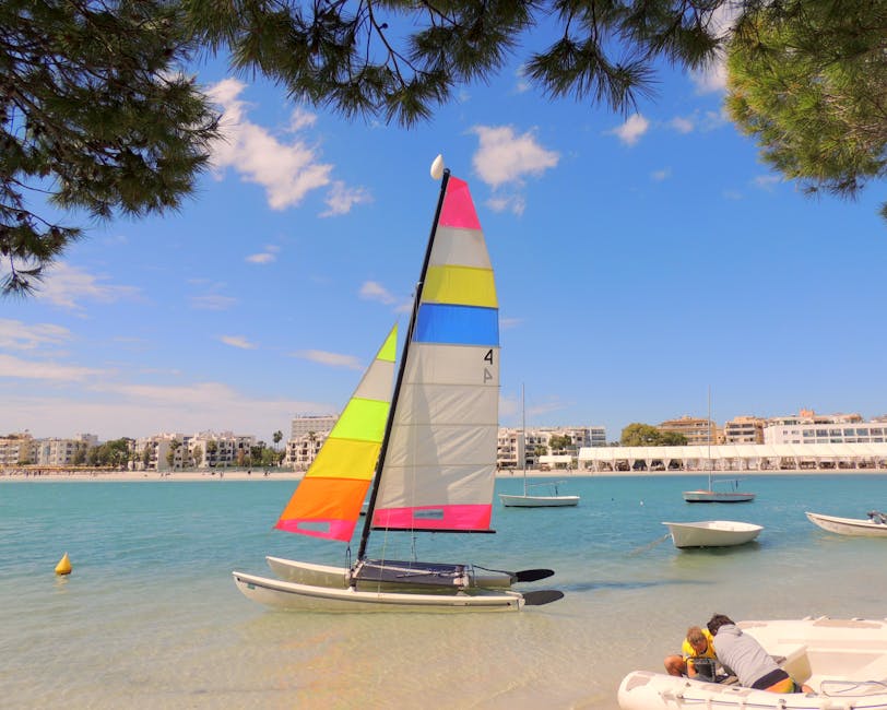 Catamaran sails near the Mallorca coast