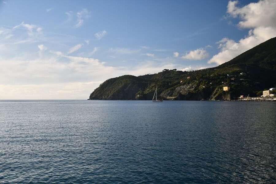 Sailboat at sunset along the Ligurian coast