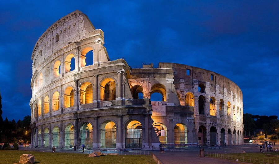 Panoramic view of the Colosseum at dusk, Rome