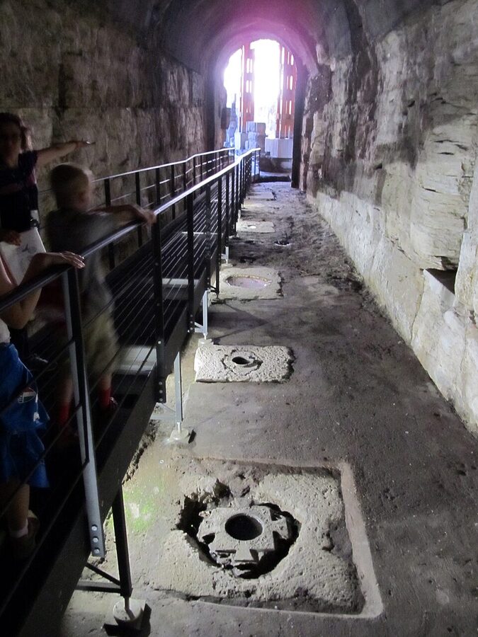 Holes in the Colosseum where winches lifted gladiators up to the arena