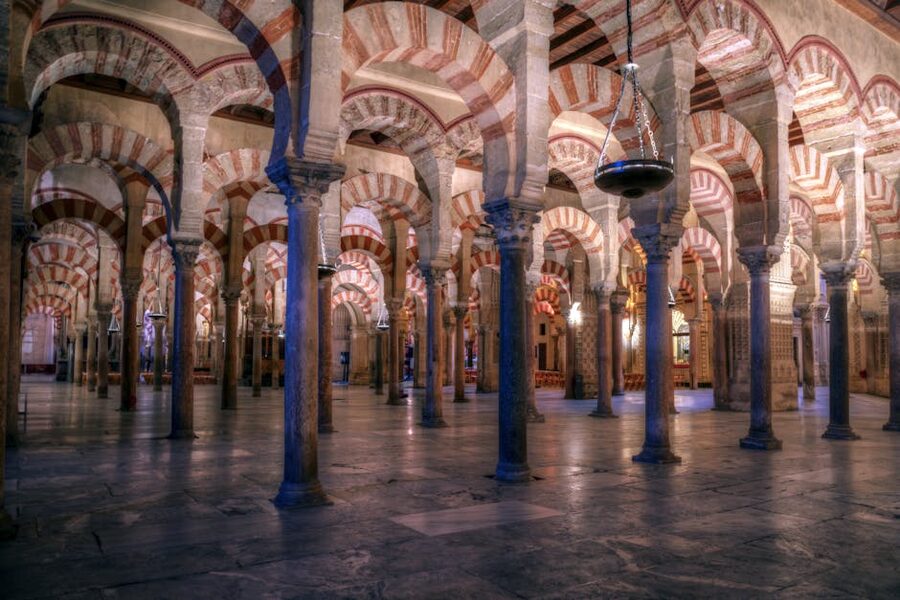 Prayer hall of La Mezquita Cordoba with horseshoe arches