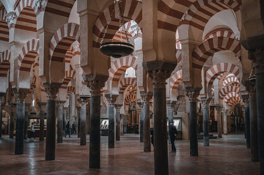 Red and white striped arches inside the Mezquita-Catedral of Cordoba