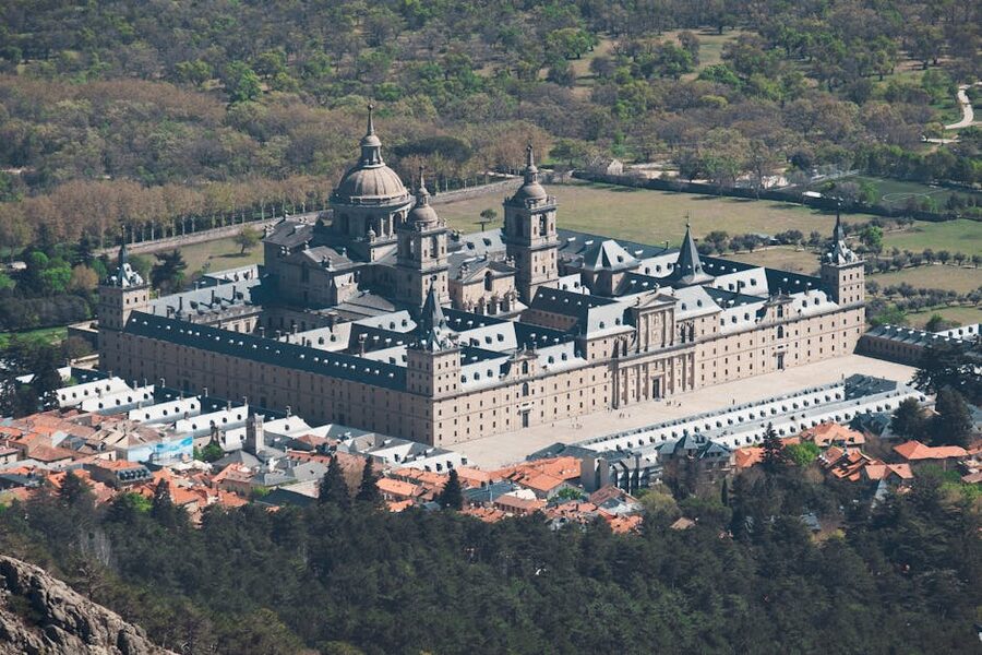 Aerial view of El Escorial Monastery showing the rectangular footprint and corner towers