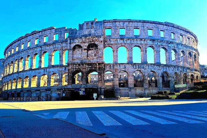 Explore layers of Pula's History in German or English - Authentic Insights from Reviews
