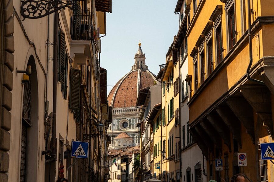 Florence historic street with cathedral dome view