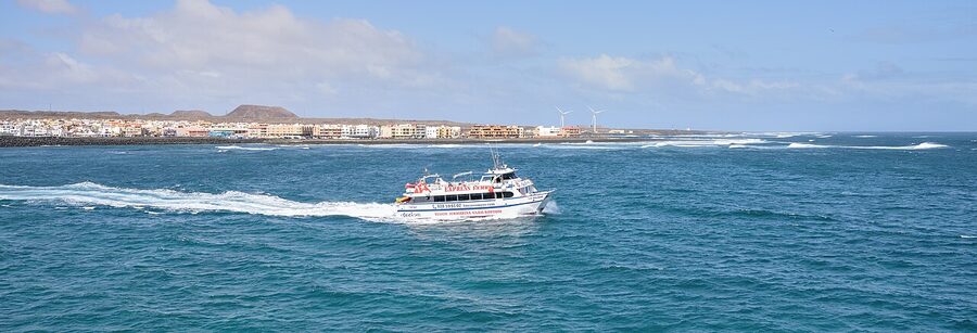 Boat approaching Corralejo port Fuerteventura