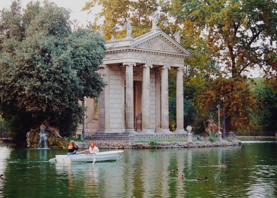 Rowboats on the lake by the Temple of Aesculapius in Villa Borghese, Rome