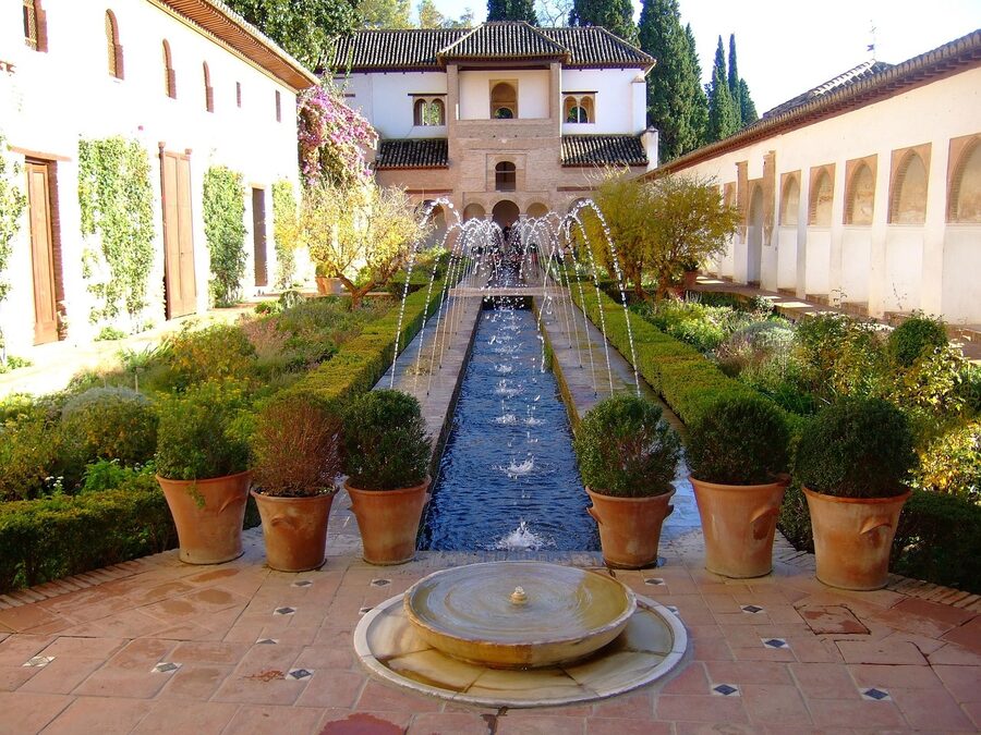Generalife gardens with flower borders along walking paths