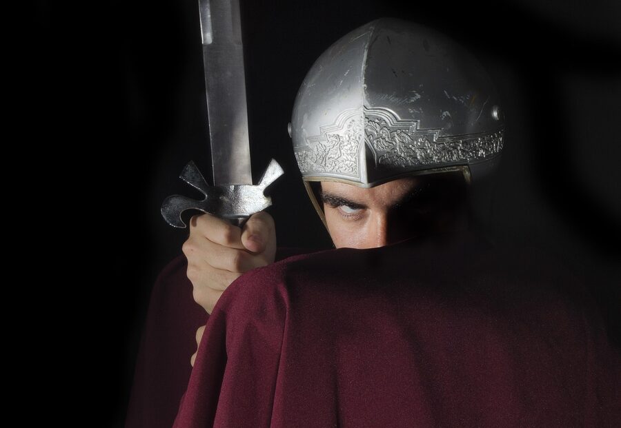 Two reenactors in full Roman gladiator gear