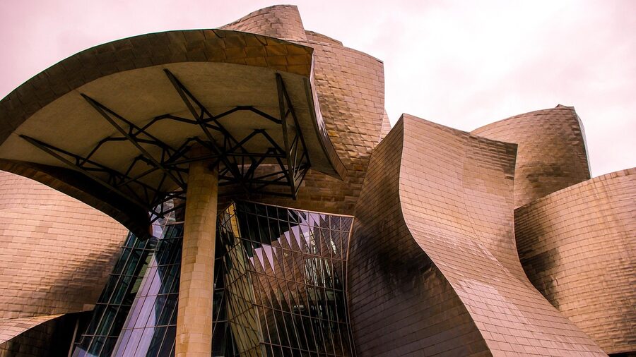 Guggenheim Bilbao curved titanium architecture from below