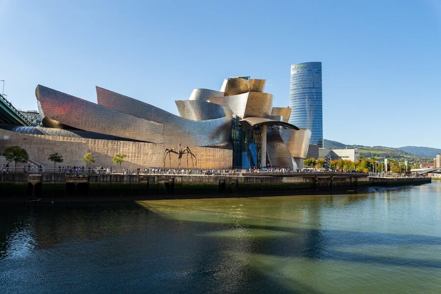 Guggenheim Bilbao reflected in pool of water