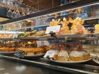 Spread of pintxos on a Bilbao bar counter