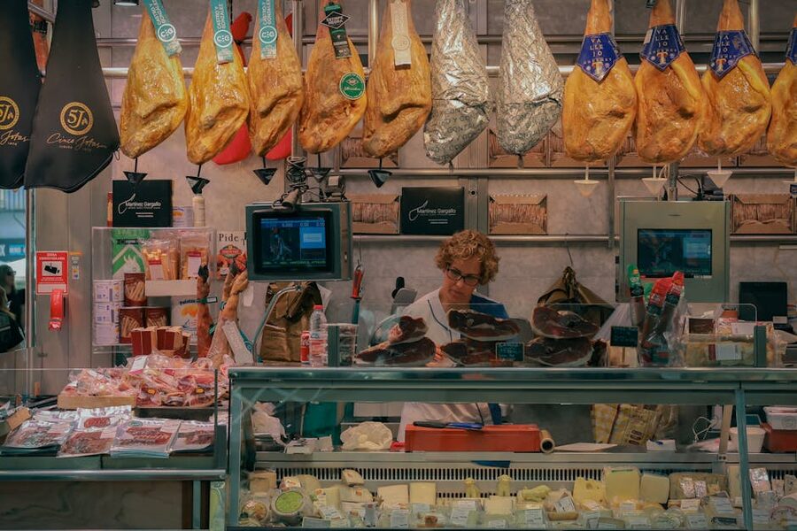 Market stall with jamon and cheese