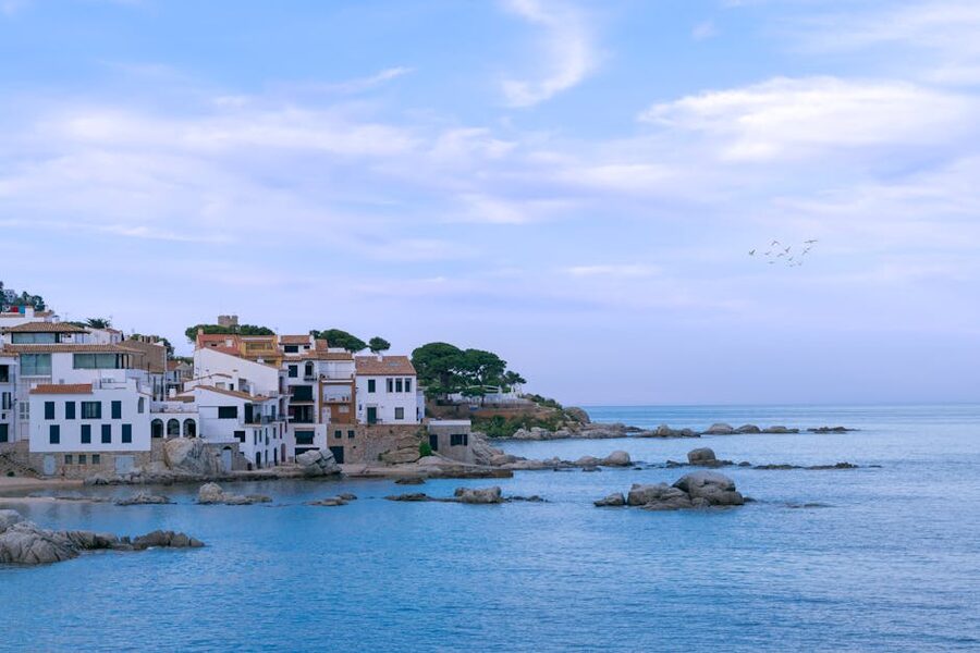 Whitewashed houses by the sea at Calella de Palafrugell on the Costa Brava