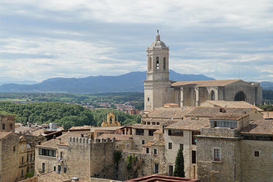 Girona cathedral with the Pyrenees foothills in the background