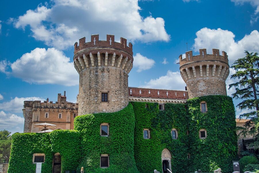 Castle ruins in Girona province with autumn trees
